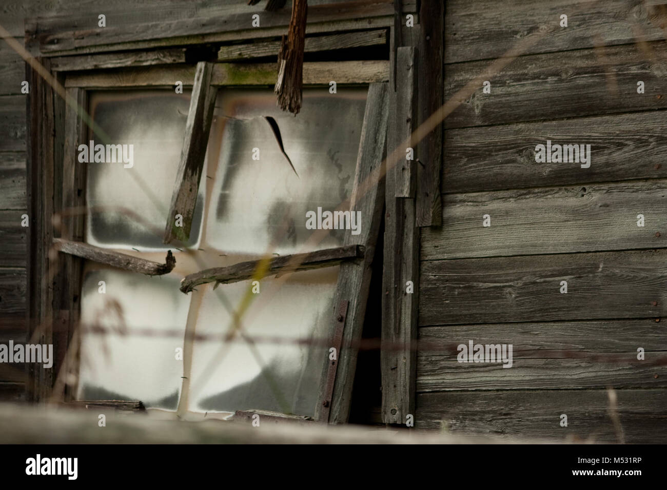 Broken Window of Abandoned Barn Stock Photo - Alamy