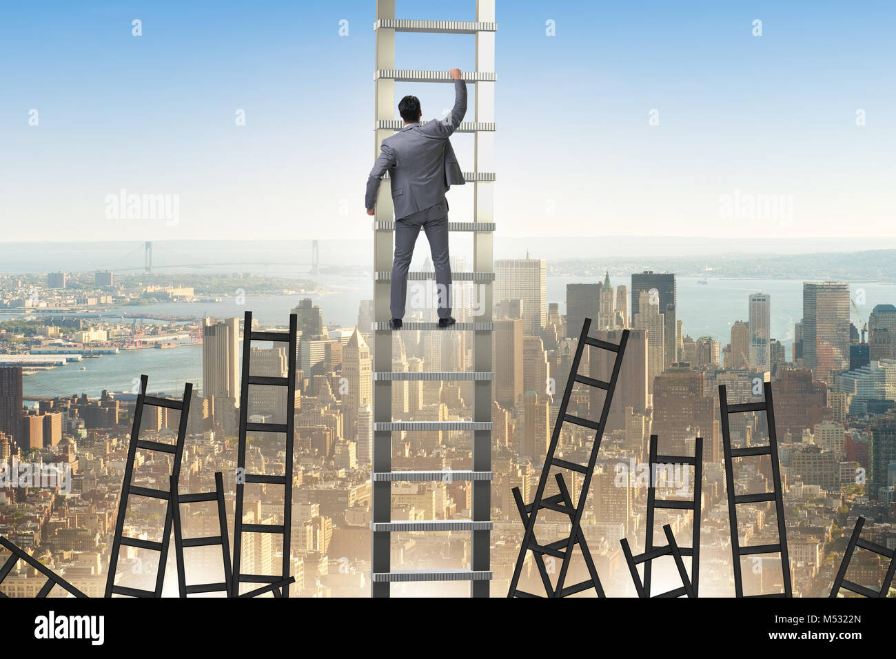 Career concept with businessman climbing ladder Stock Photo - Alamy