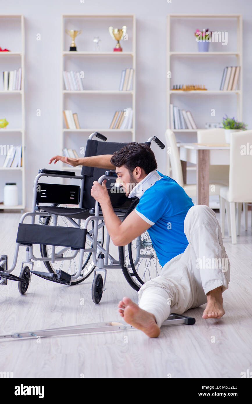 Injured young man recovering at home Stock Photo - Alamy