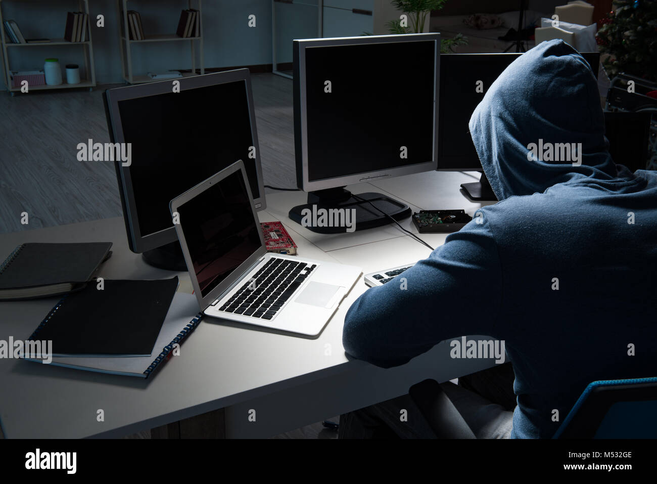 Hacker hacking computer at night Stock Photo - Alamy