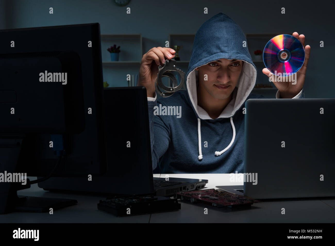 Hacker hacking computer at night Stock Photo - Alamy