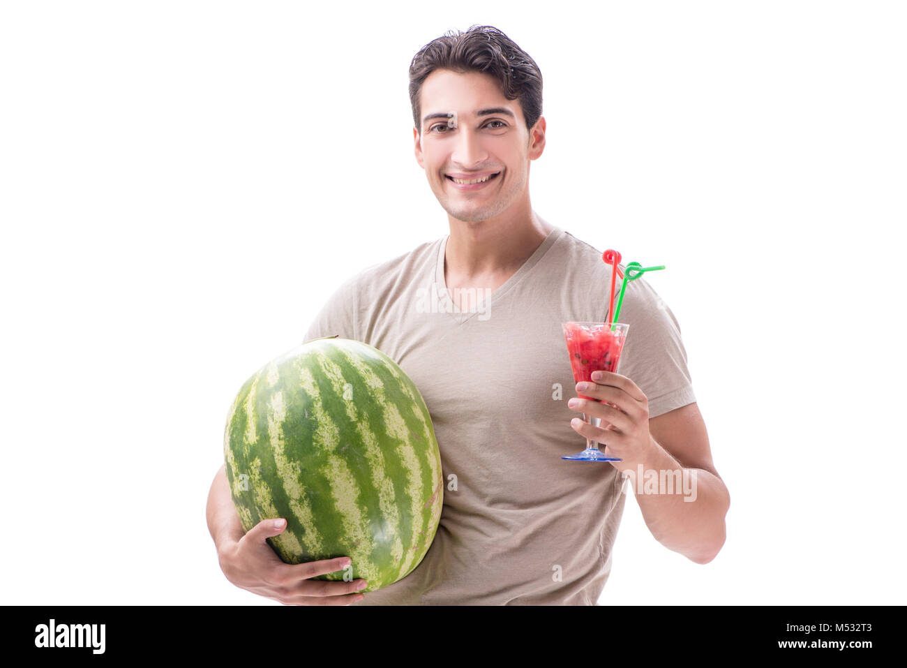 Young man with watermelon isolated on white Stock Photo - Alamy