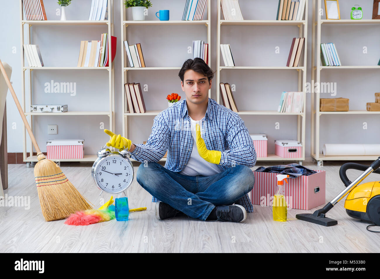 Man doing cleaning at home Stock Photo - Alamy
