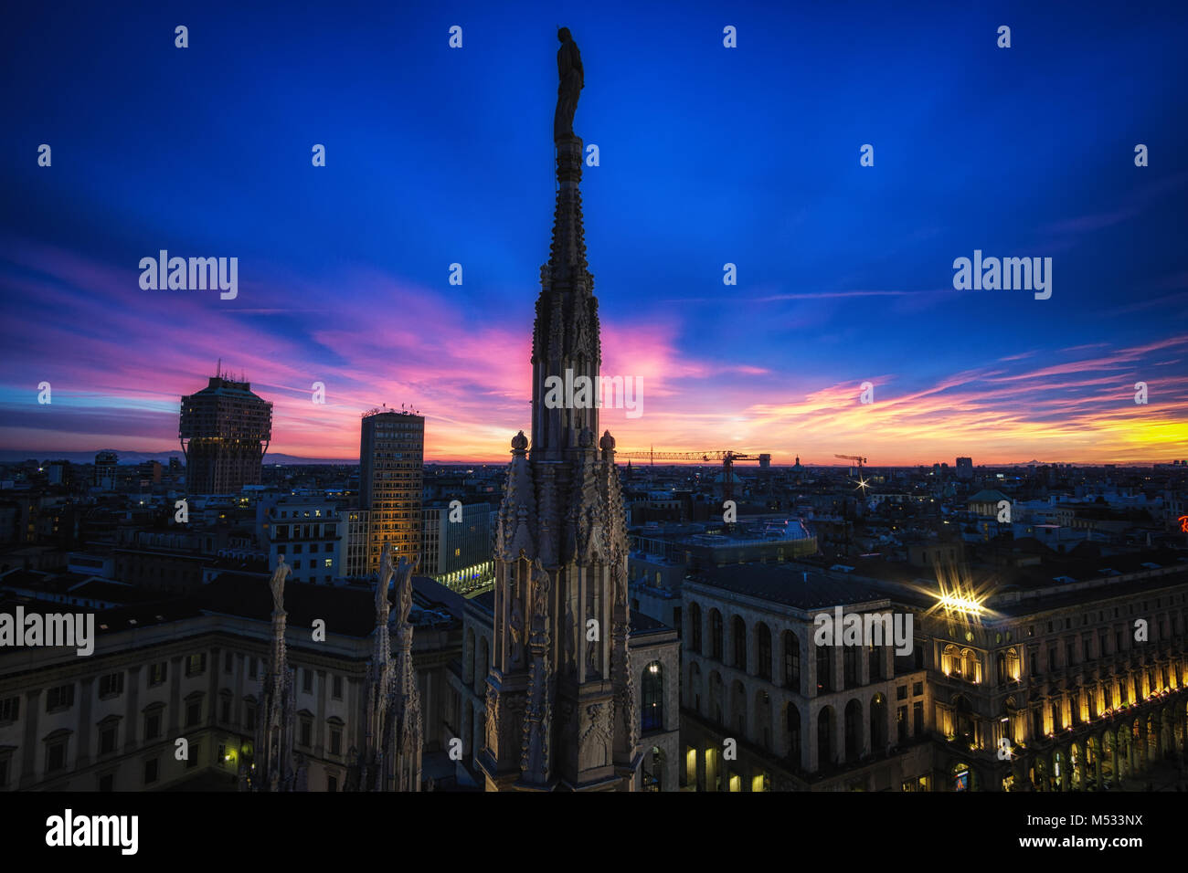 Milan Duomo rooftop Stock Photo - Alamy
