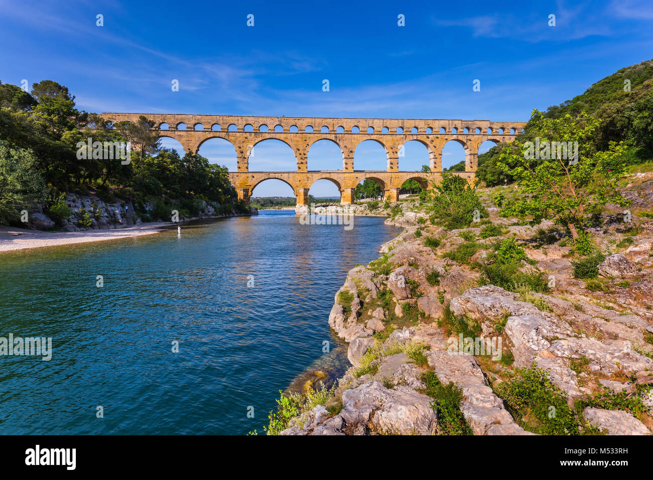 Three-storied aqueduct of Pont du Gard in Europe Stock Photo - Alamy