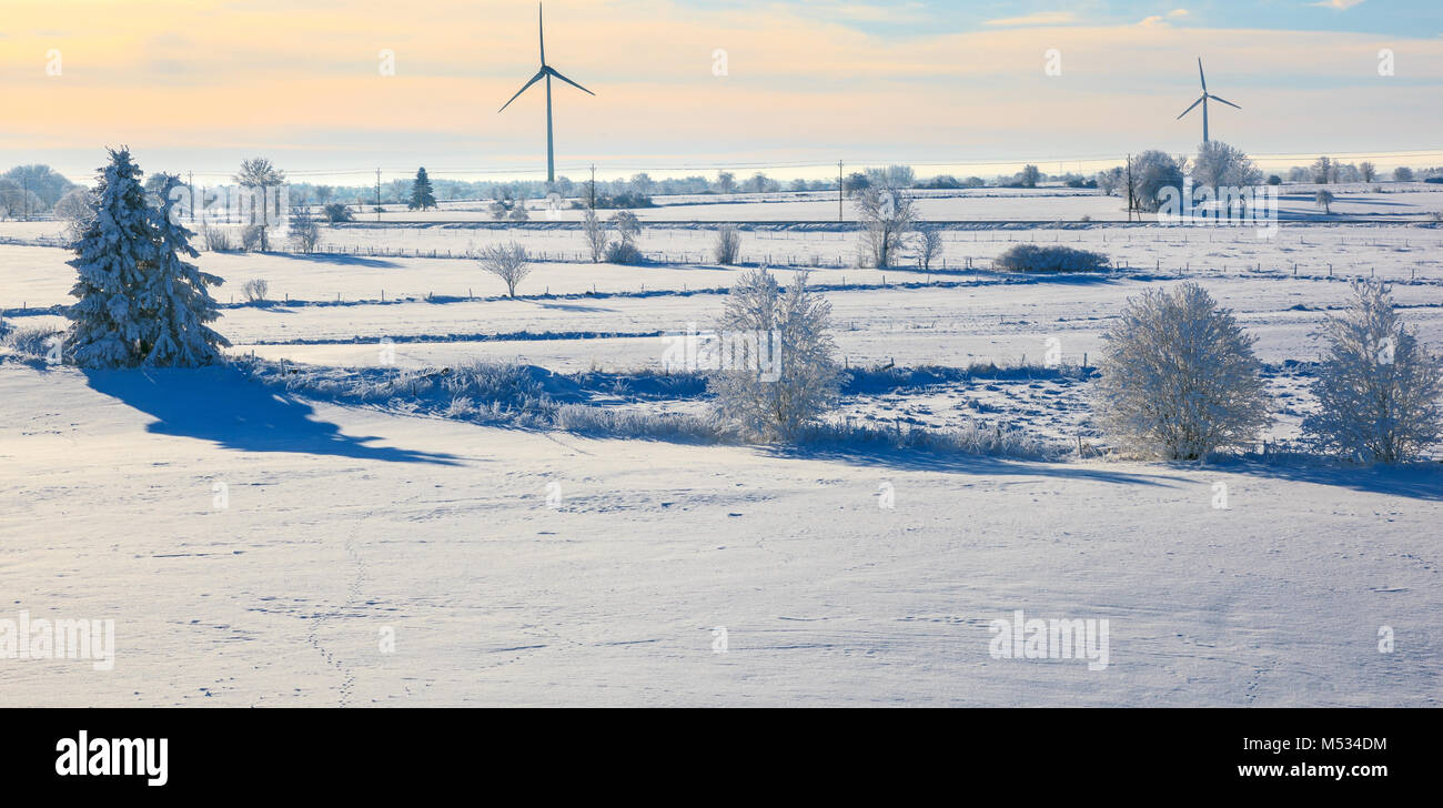 Winter landscape with wind turbines Stock Photo - Alamy