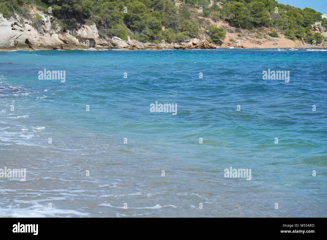 Blue bay on the Costa Daurada Stock Photo - Alamy