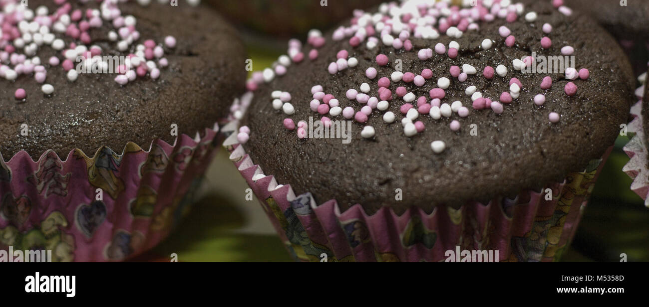 Muffins In Pink Forms For Baking Stock Photo - Alamy
