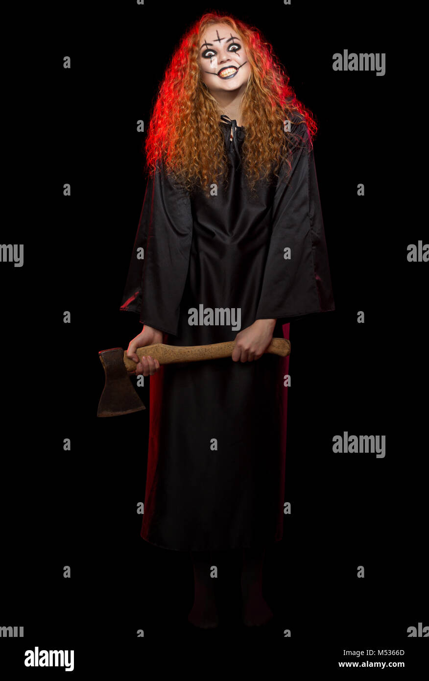 Scary witch isolated on black Stock Photo - Alamy