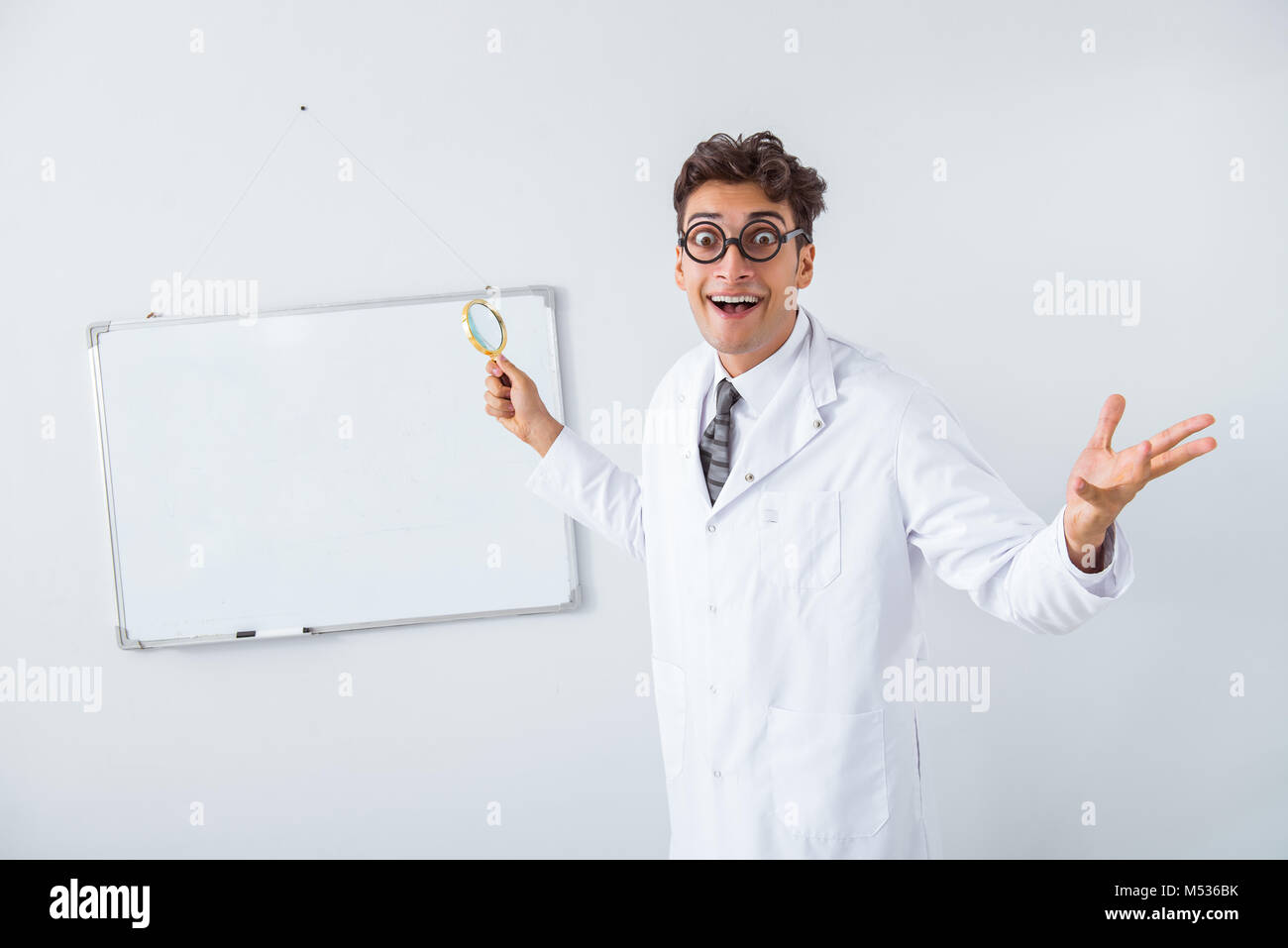 Funny doctor scientist making presentation in hospital Stock Photo - Alamy