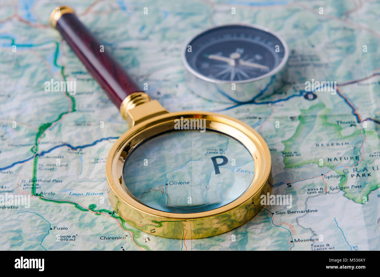 Travel concept with compass and map Stock Photo - Alamy