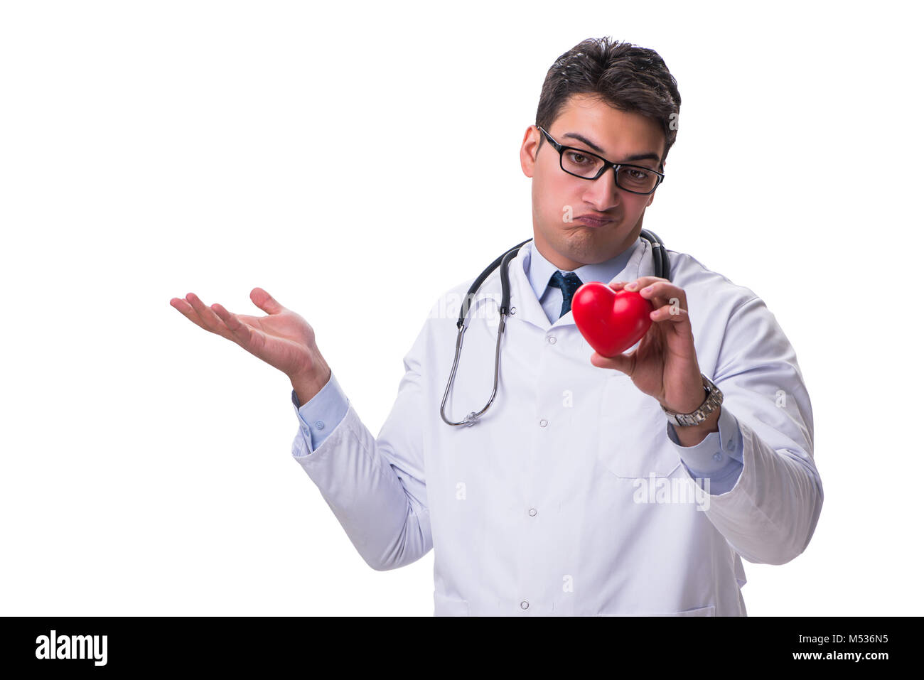 Young male cardiologist doctor holding a heart isolated on white Stock ...