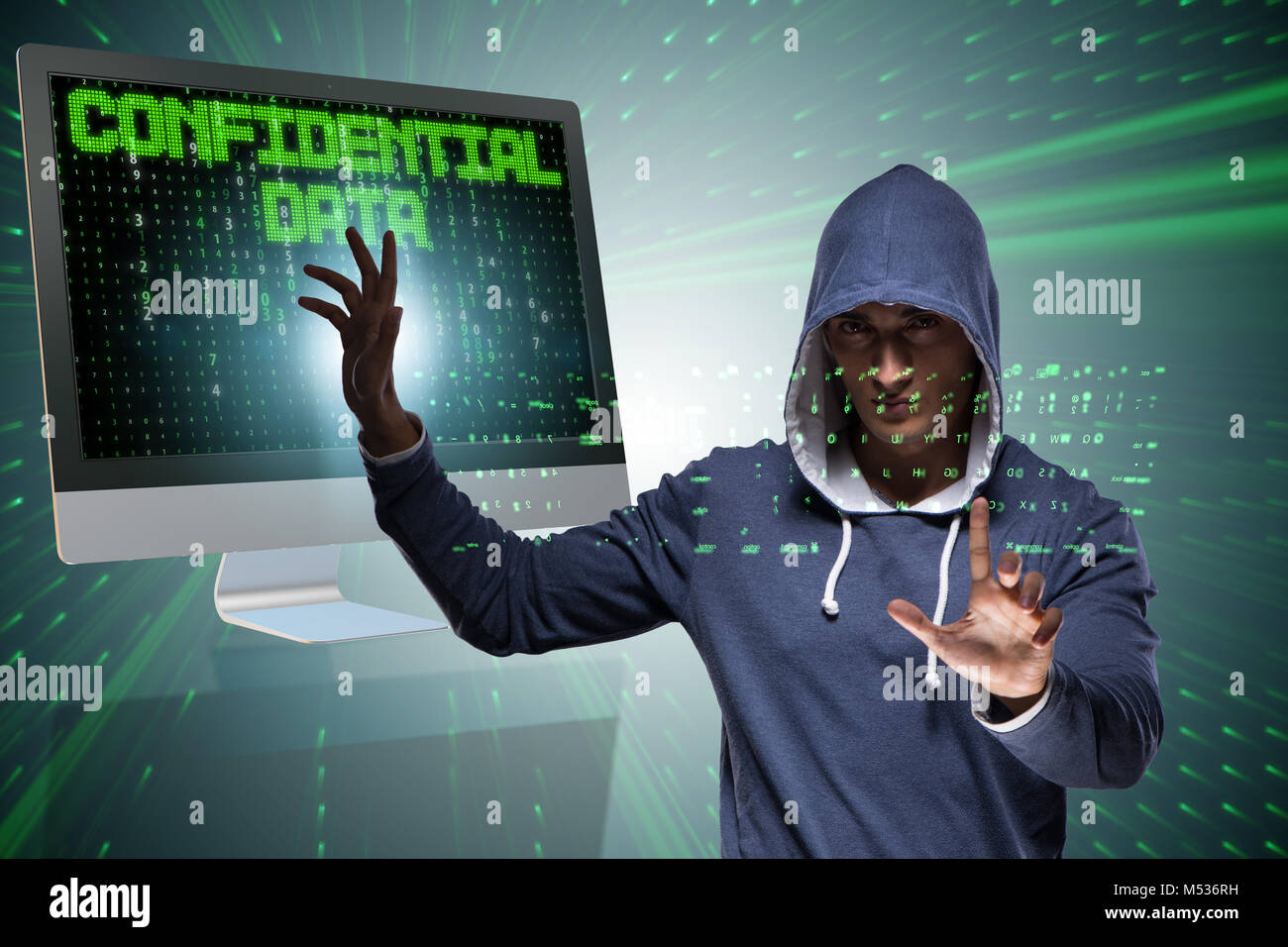 Hooded hacker in data computer security concept Stock Photo - Alamy