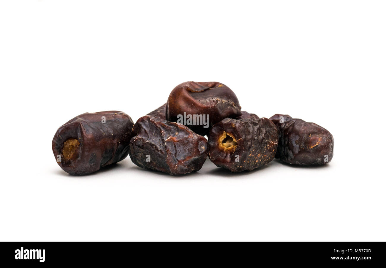 Dates on white background Stock Photo - Alamy