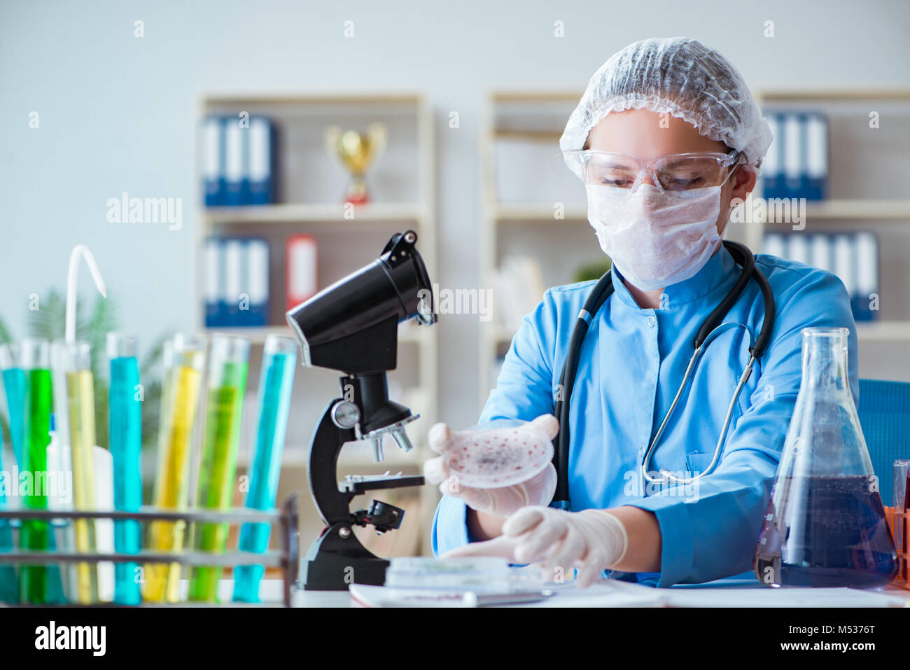 Female scientist researcher doing experiments in laboratory Stock Photo ...