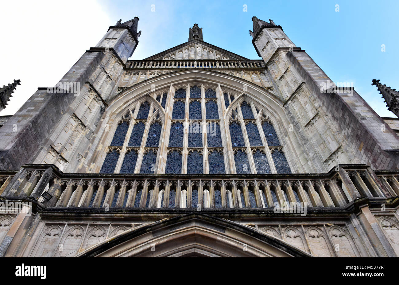 The historic architecture of Winchester cathedral main entrance looking ...