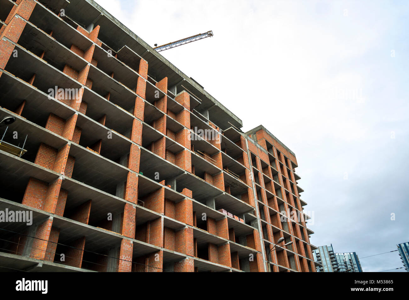 Ground view of a new modern residential house building under ...