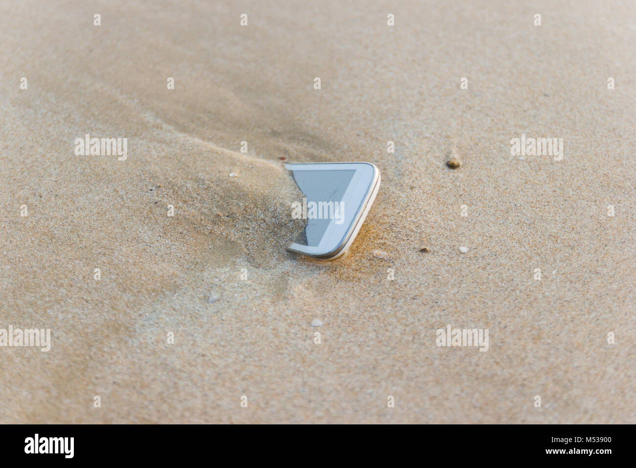 Mobile phone floated to the sea at the beach Stock Photo - Alamy
