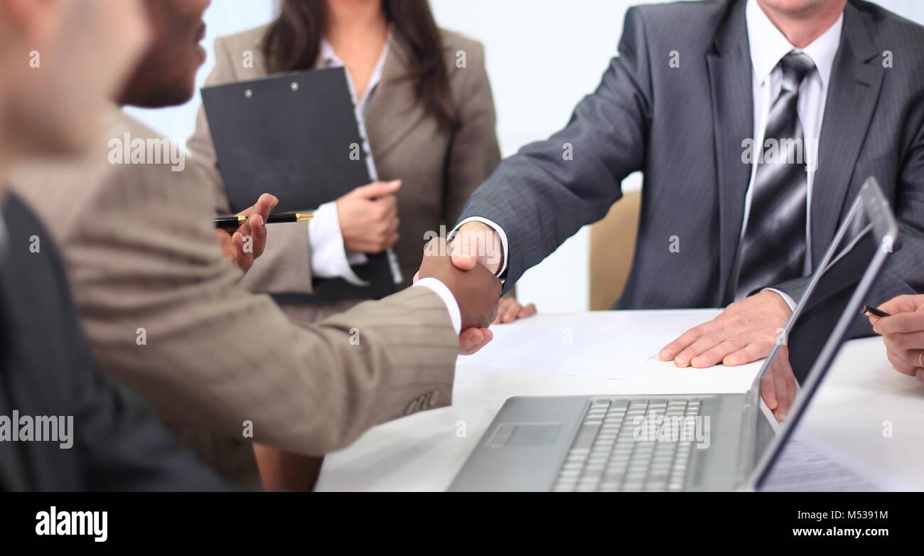 handshake business partners at a business meeting Stock Photo - Alamy