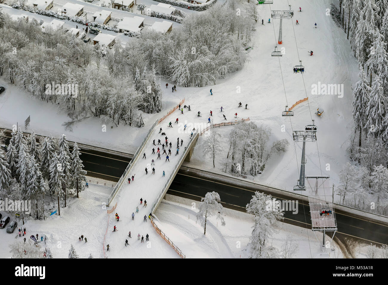 Aerial view, ski bridge, ski lift, snakes in front of the ski lift ...