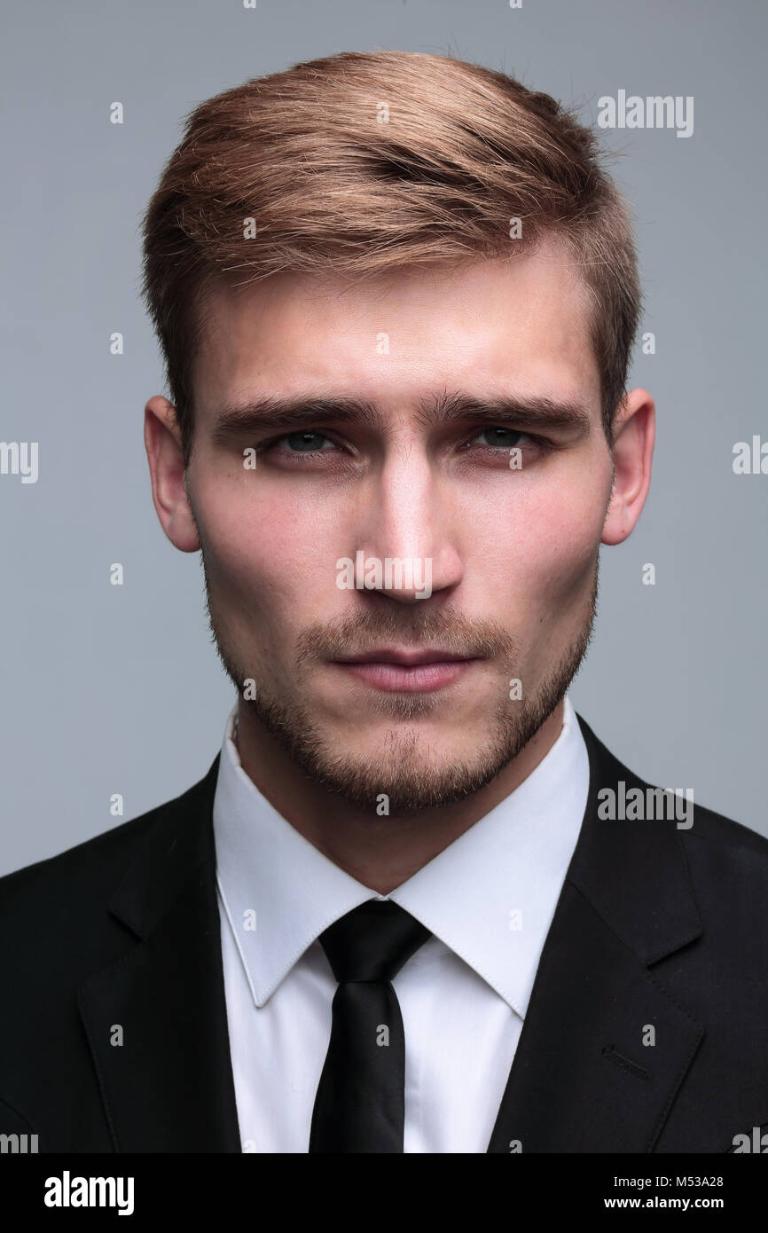 closeup face of a serious businessman Stock Photo - Alamy