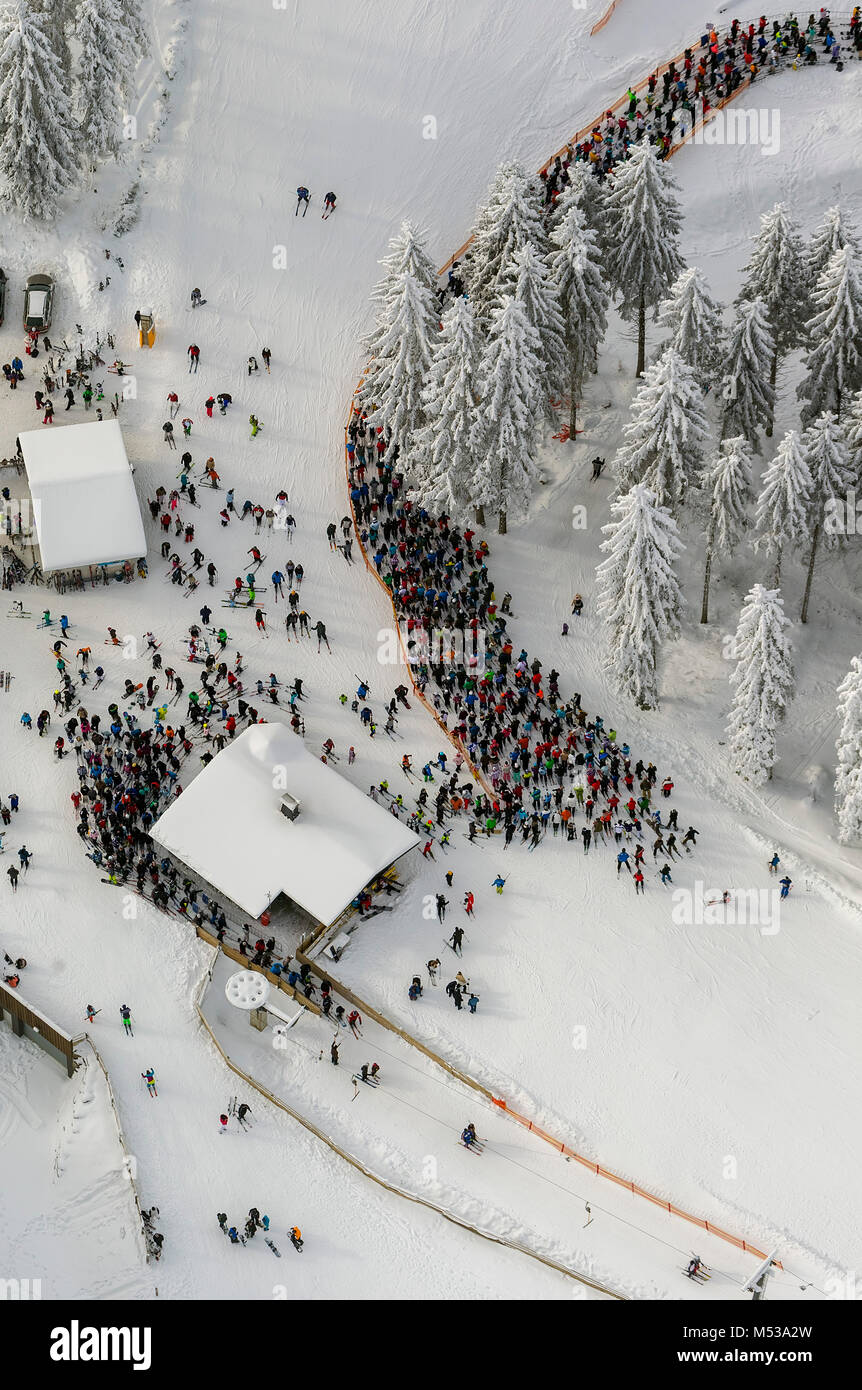 Aerial view, ski lift, snow, wating line in front of the ski lift ...