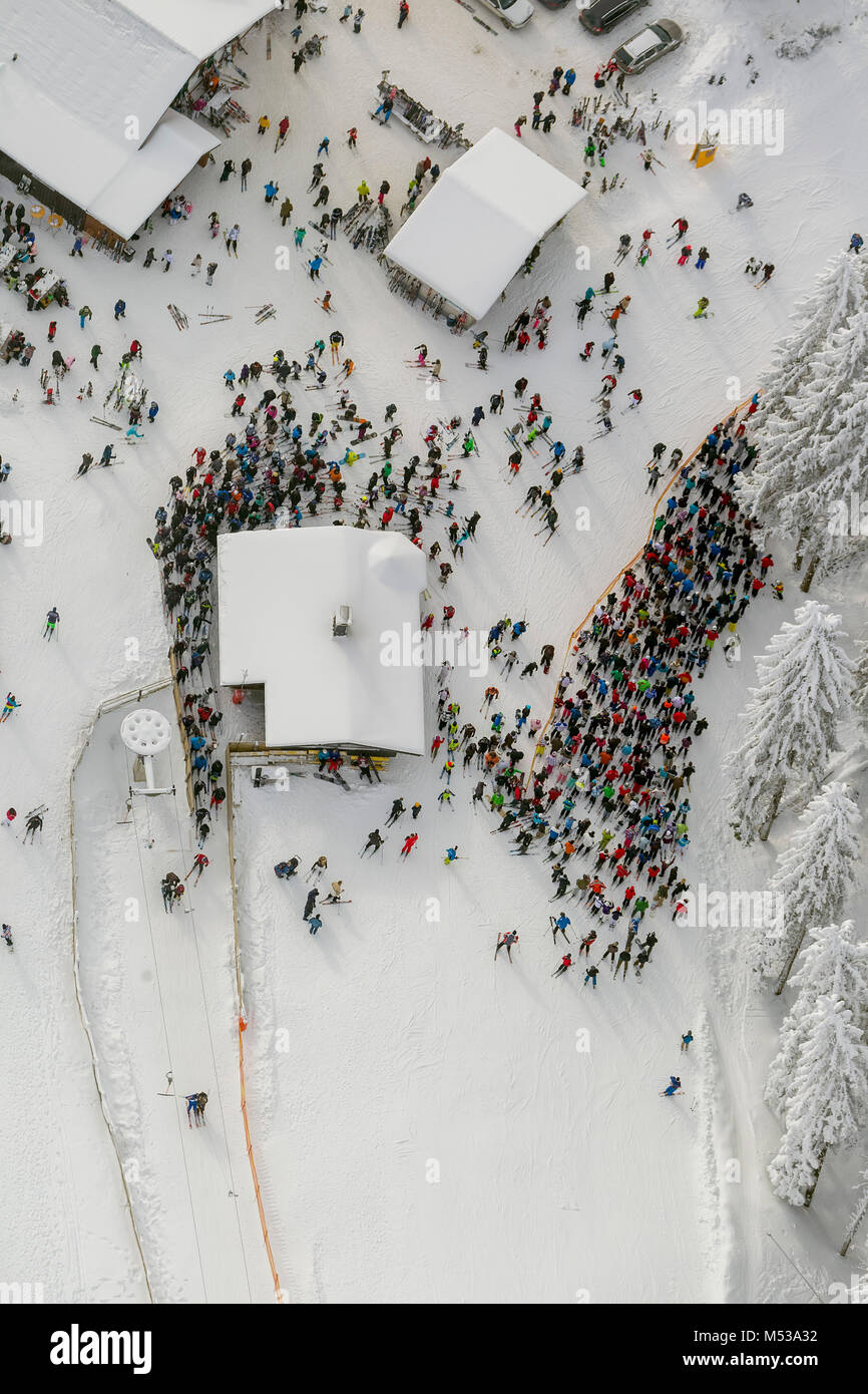 Aerial view, ski lift, snow, wating line in front of the ski lift ...