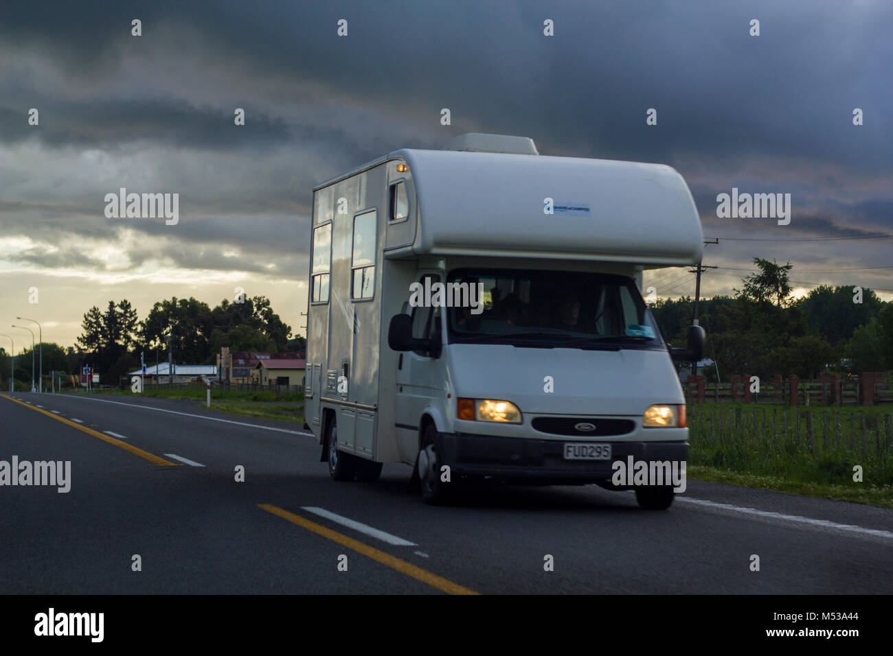 Road trip caravan passing on New Zealand asphalt Road Stock Photo - Alamy