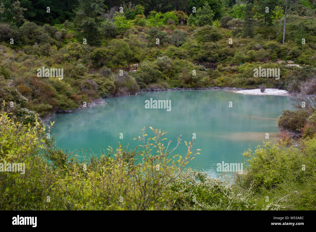 Thermal Blue Lake With Steam Stock Photo - Alamy