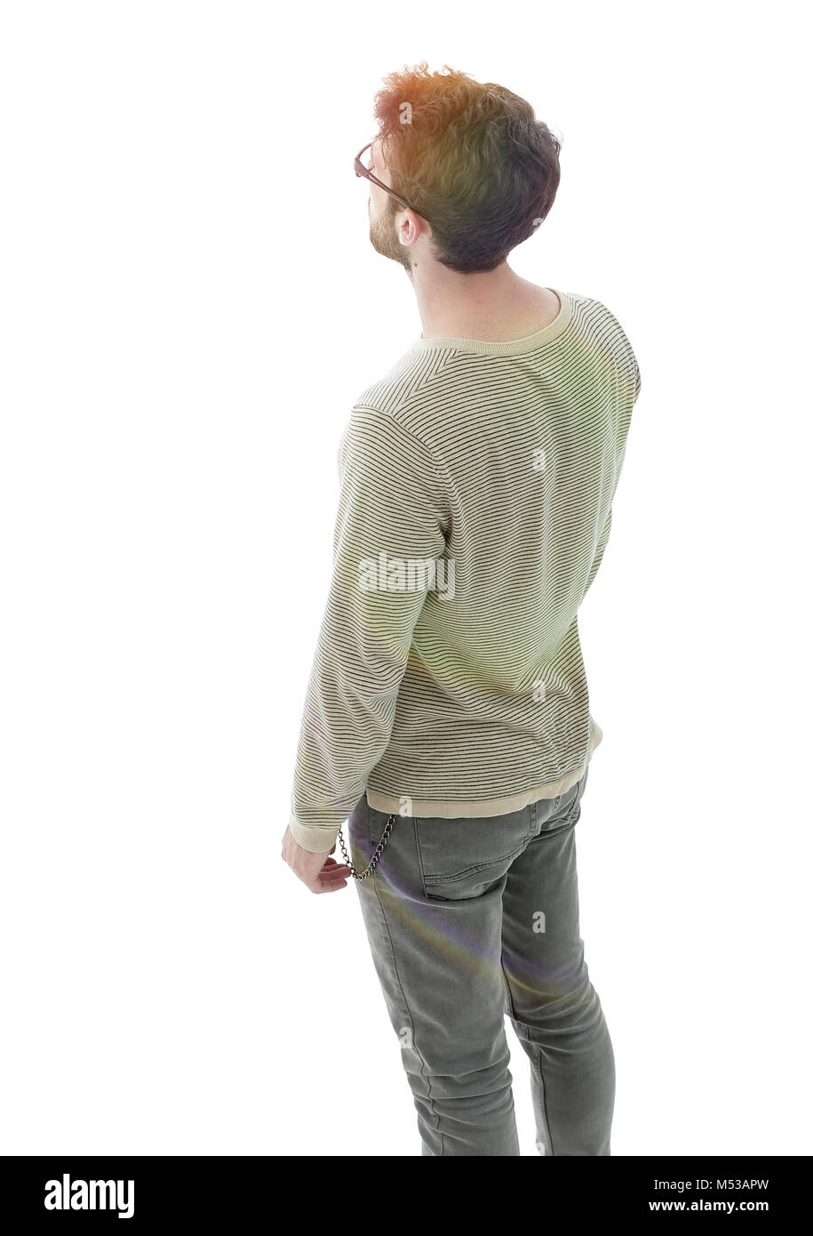 modern young man looks confidently forward. Photo in full length Stock ...