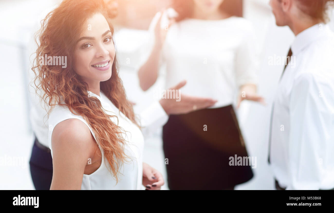 Executive business woman with colleagues Stock Photo - Alamy