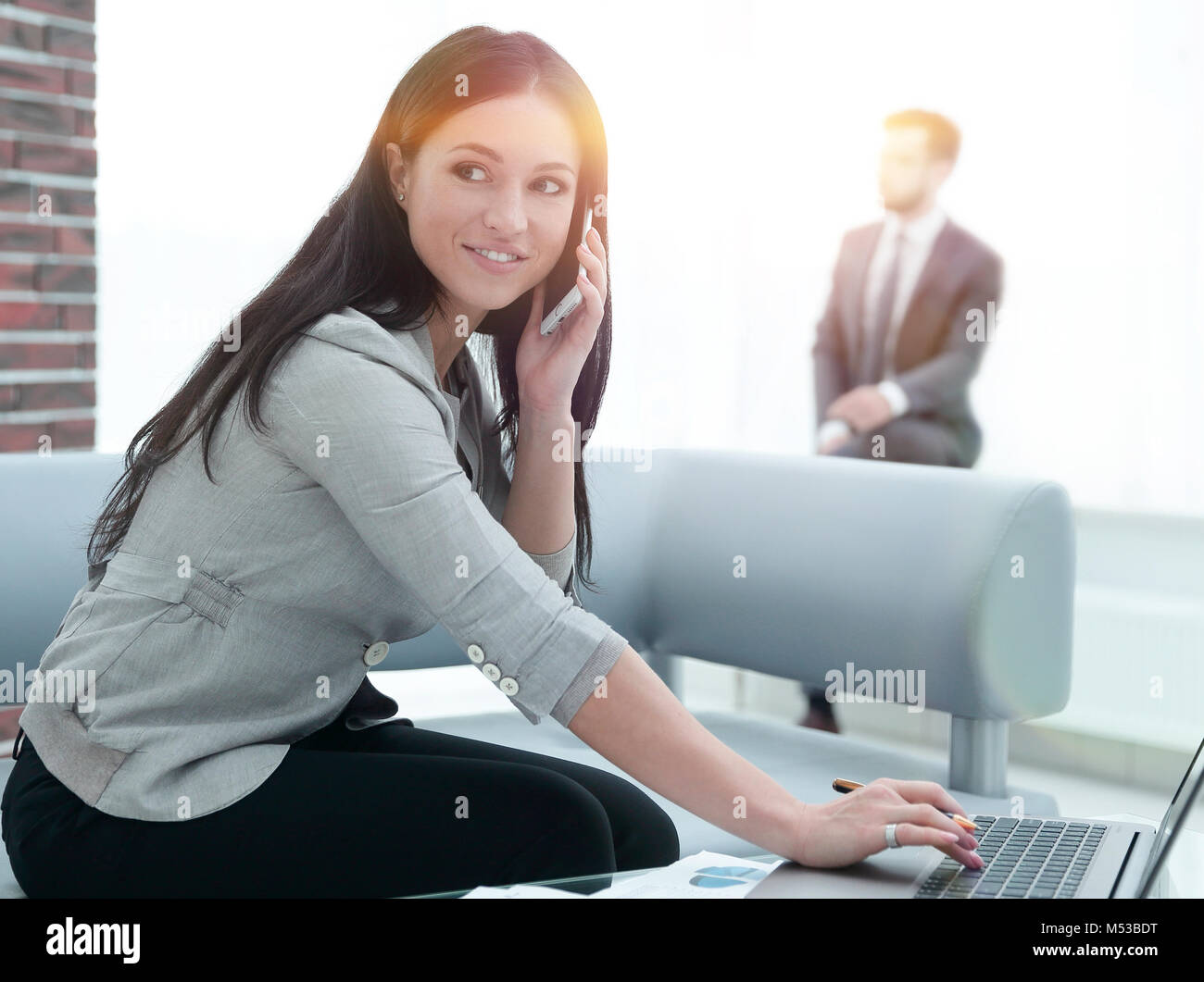 Woman assistant at her workplace Stock Photo - Alamy