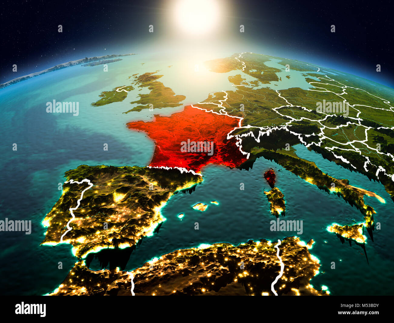 Sunrise above France highlighted in red on model of planet Earth in ...