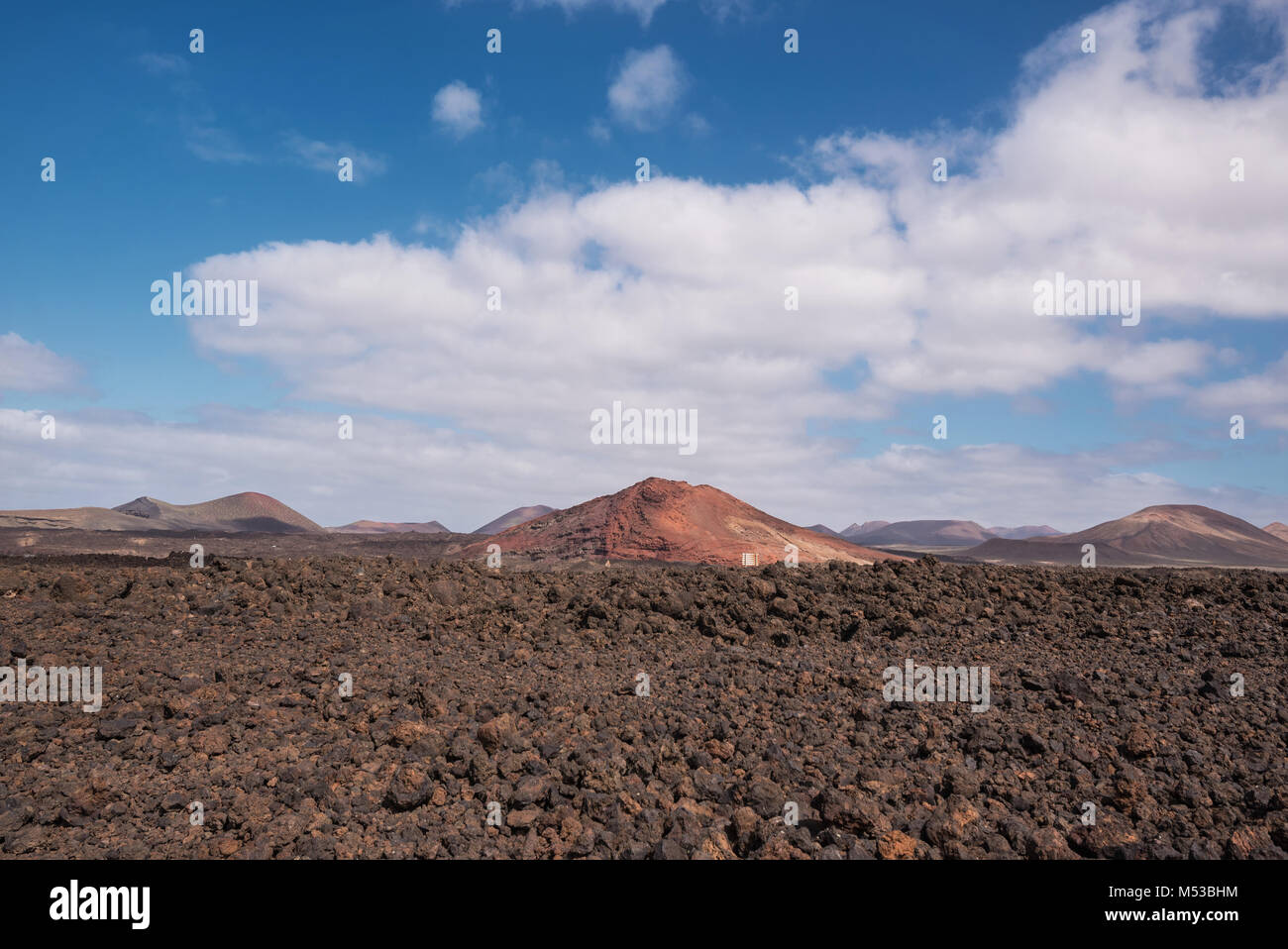 Red volcanic landscape, lava scenary with volcano crater in the ...