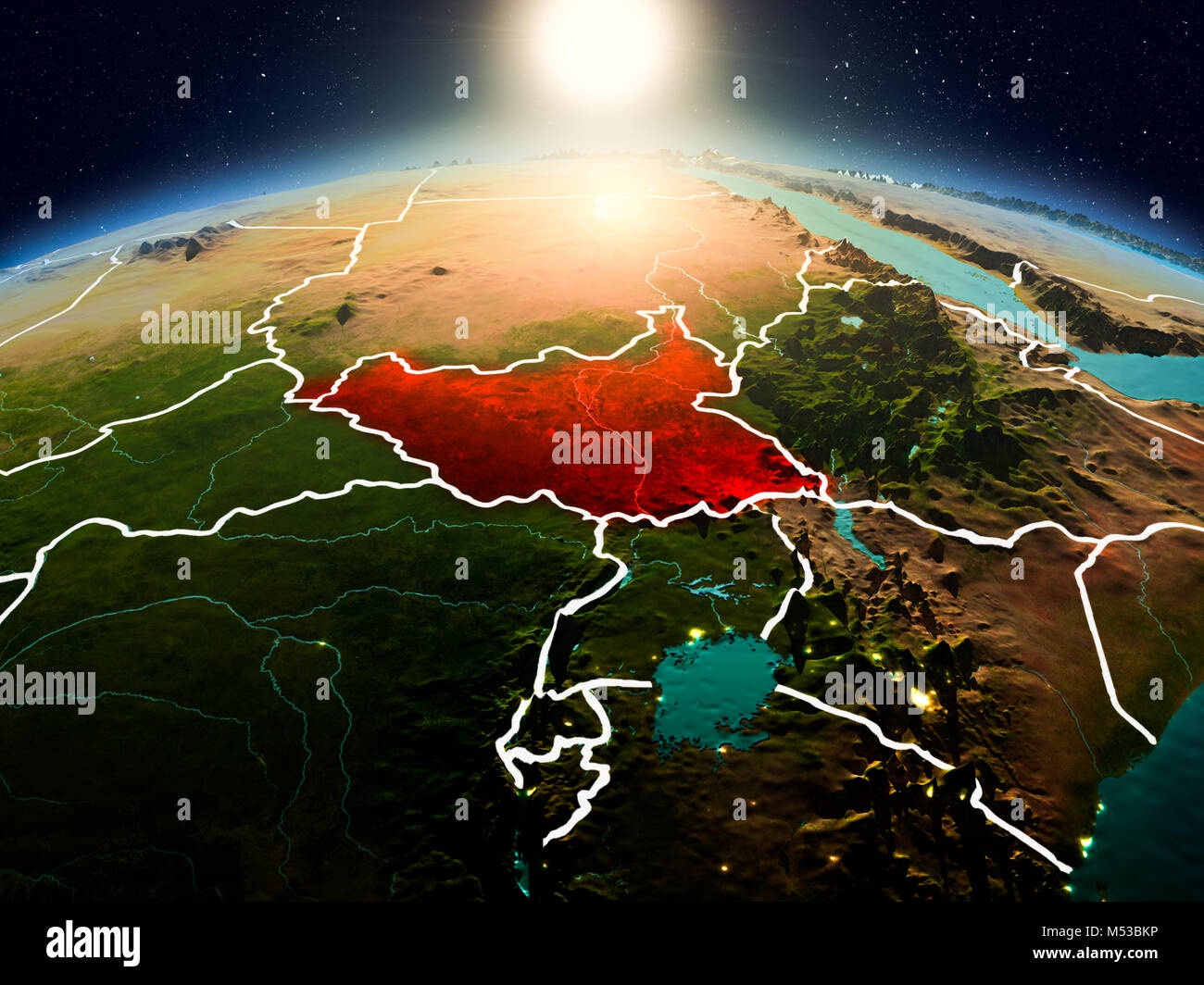 Sunrise above South Sudan highlighted in red on model of planet Earth in space with visible ...