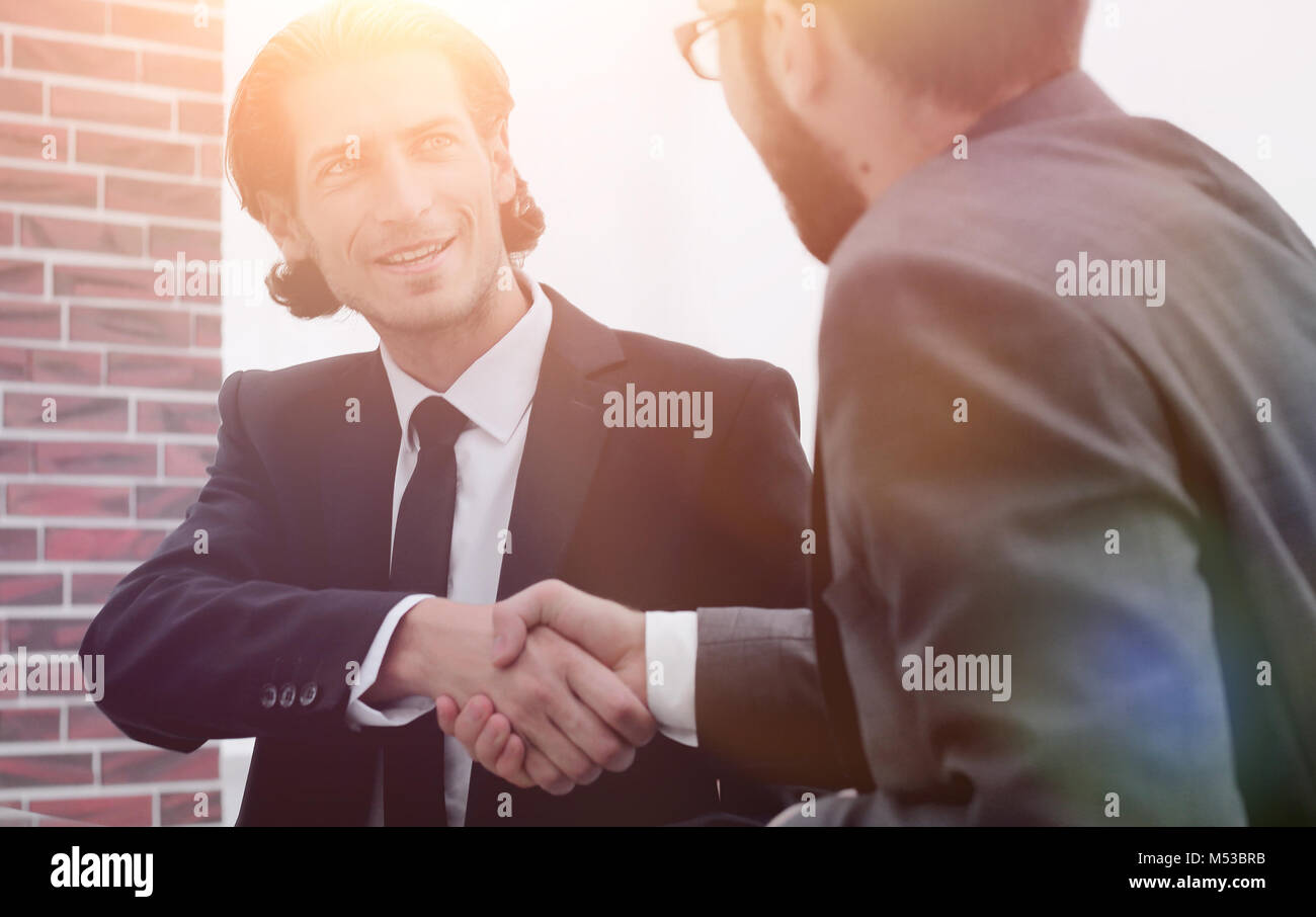 handshake reliable partners in the office Stock Photo - Alamy