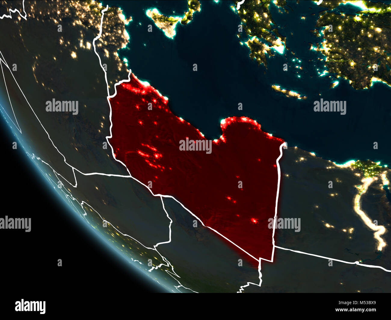 Satellite view of Libya highlighted in red on planet Earth at night ...
