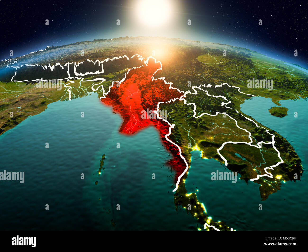 Sunrise above Myanmar highlighted in red on model of planet Earth in ...