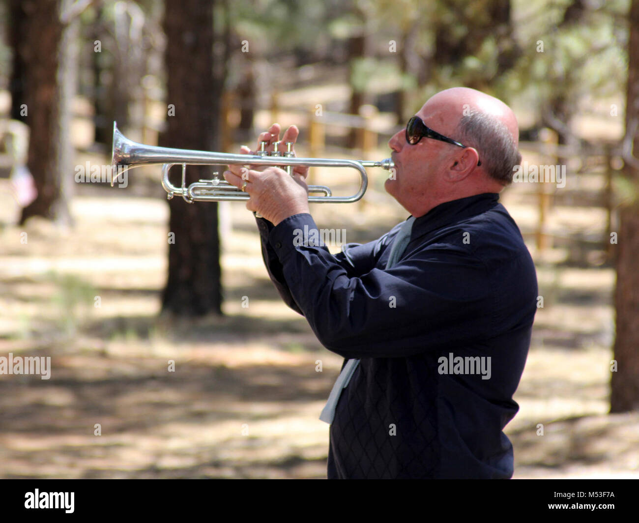 Playing taps hi-res stock photography and images - Alamy