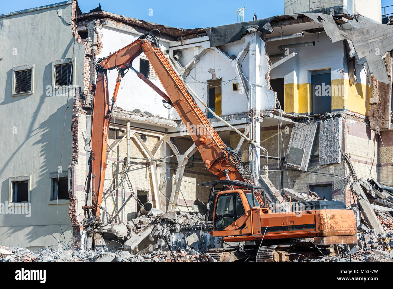demolition of old building with excavator for new construction Stock ...