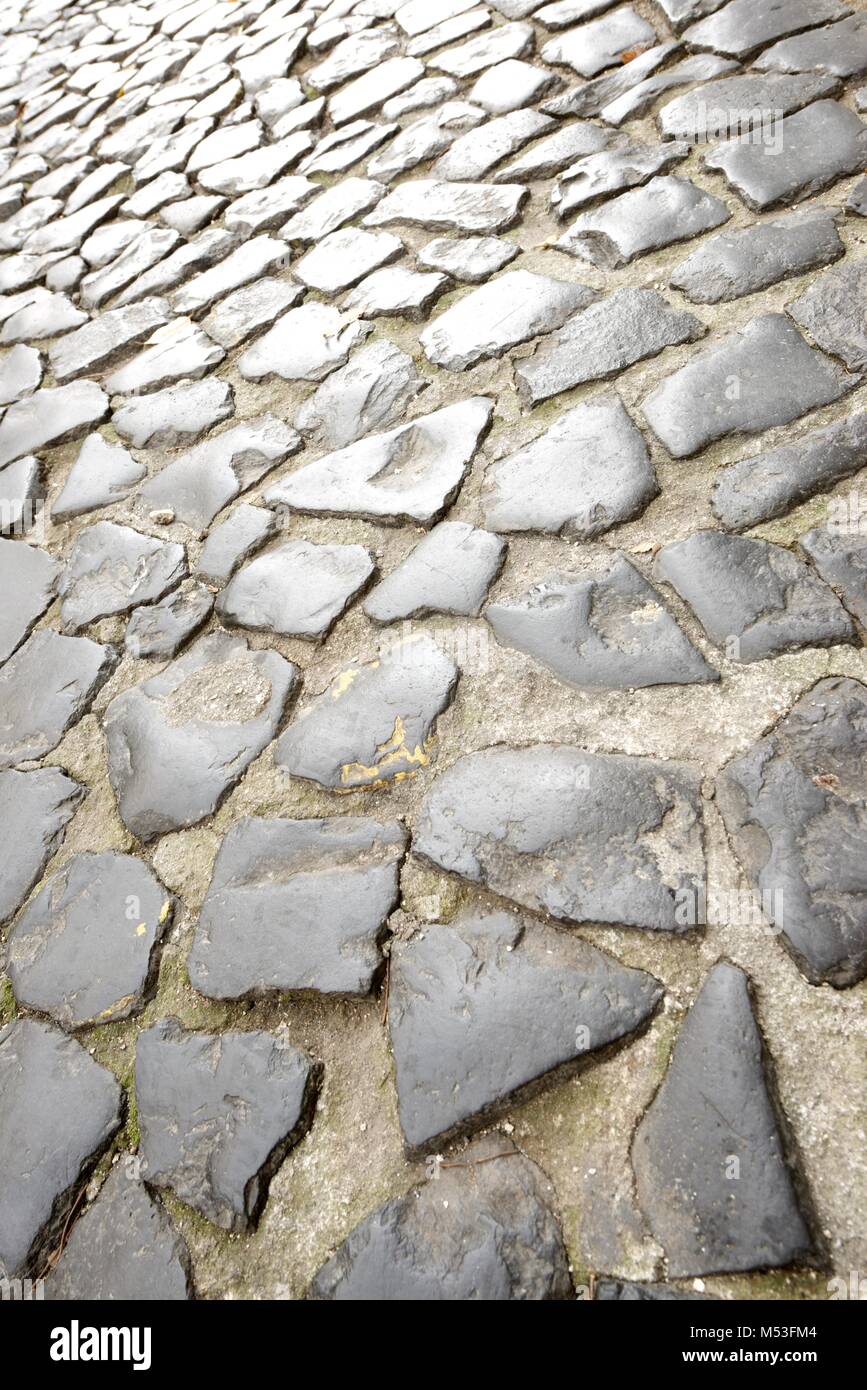 Floor of a street with stone tiles, Lisbon, Portugal Stock Photo - Alamy