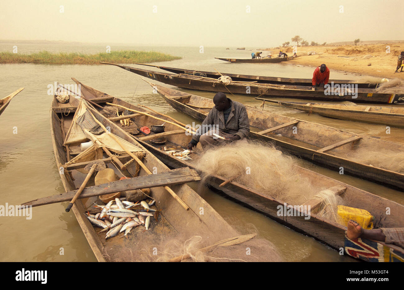 Mali. Timbuktu. Sahara desert. Sahel. River called:Niger. Fisherman in ...