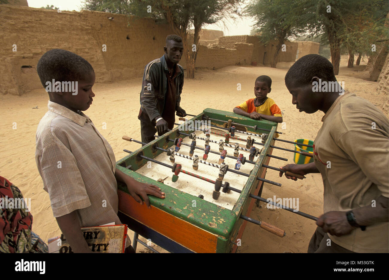 Mali. Bamba, Gao. Sahara desert. Sahel. Boys playing Table football ...
