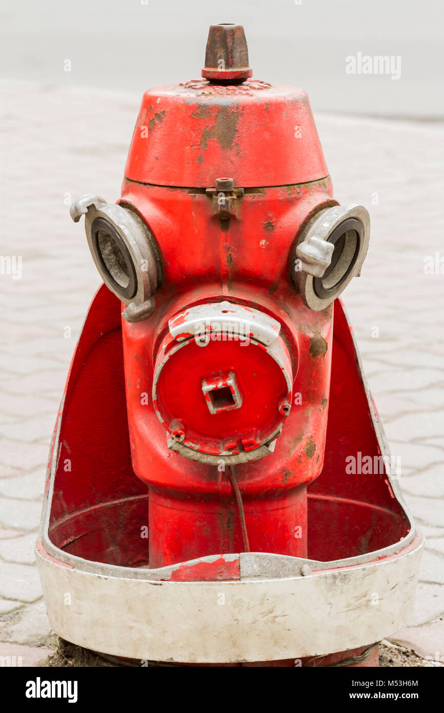 Retro red fire hydrant on the city street Stock Photo - Alamy