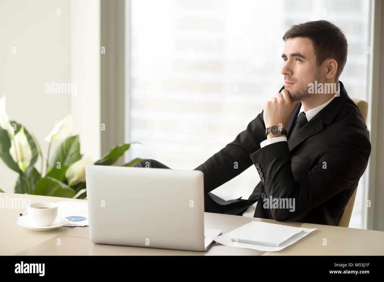 Pensive investor hi-res stock photography and images - Alamy
