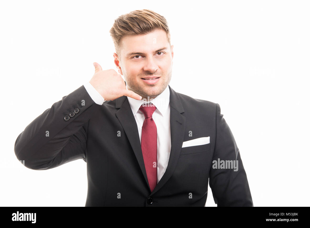 Handsome business man showing contact gesture isolated on white ...