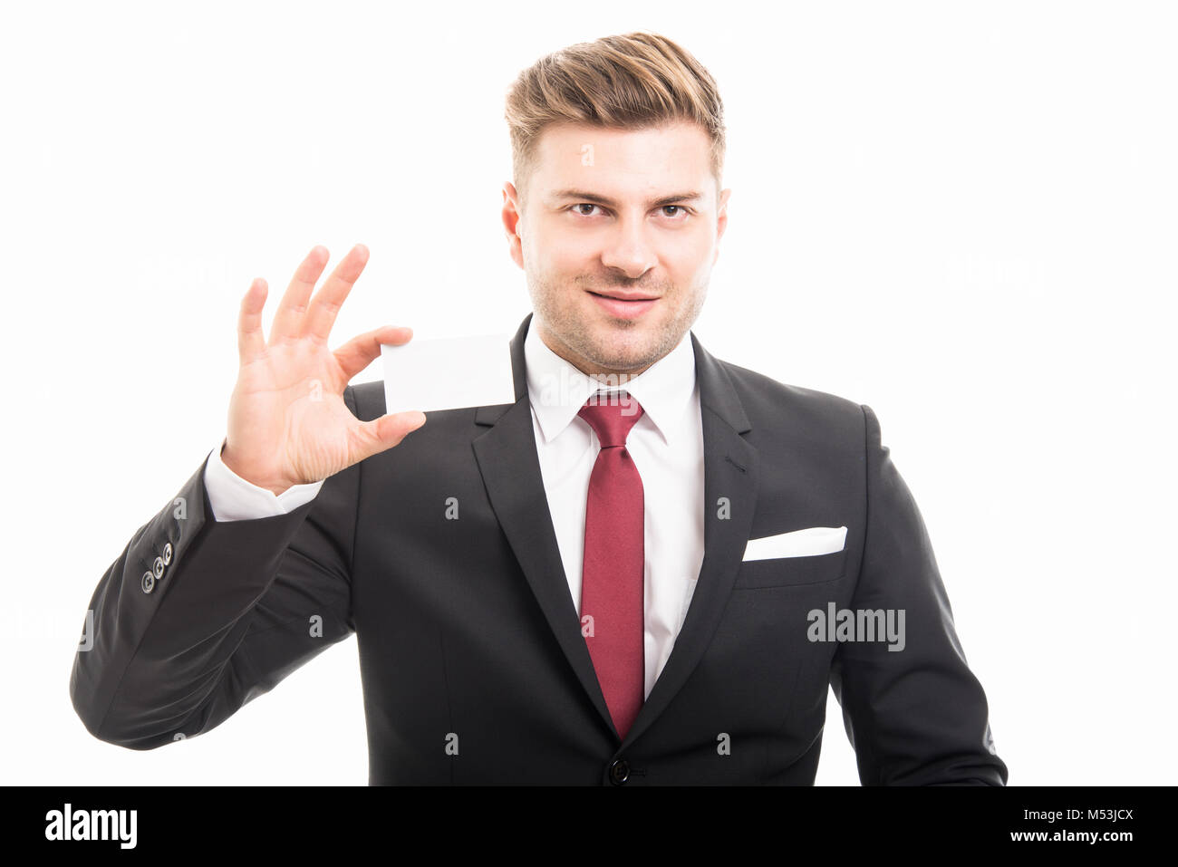 Handsome manager showing blank business card and smiling isolated on ...