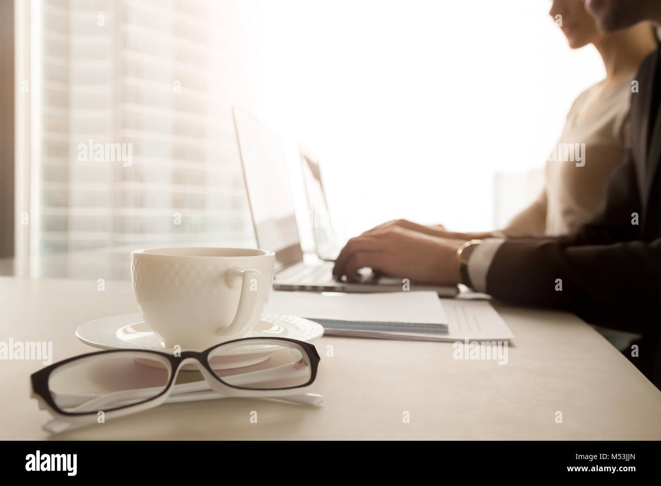 Female and male company employees using computers Stock Photo - Alamy