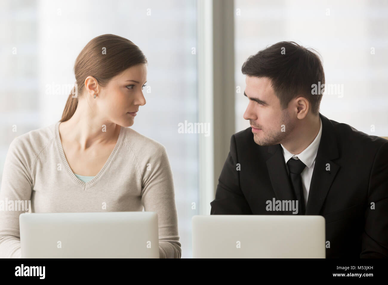 Suspicious woman and computer hi-res stock photography and images - Alamy