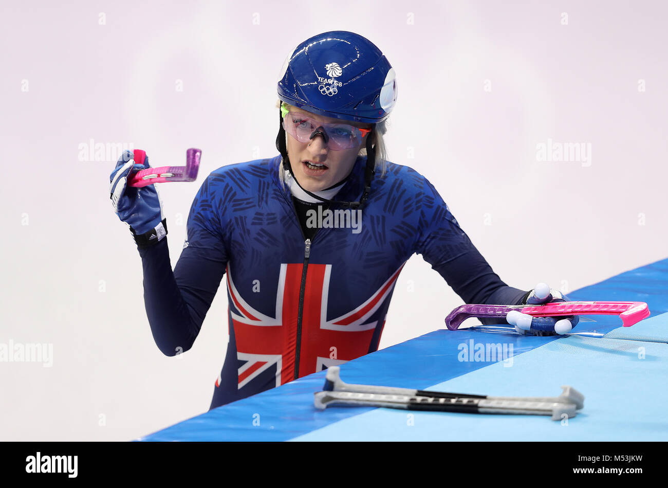 Great Britain's Elise Christie prepares to leave the ice after being ...